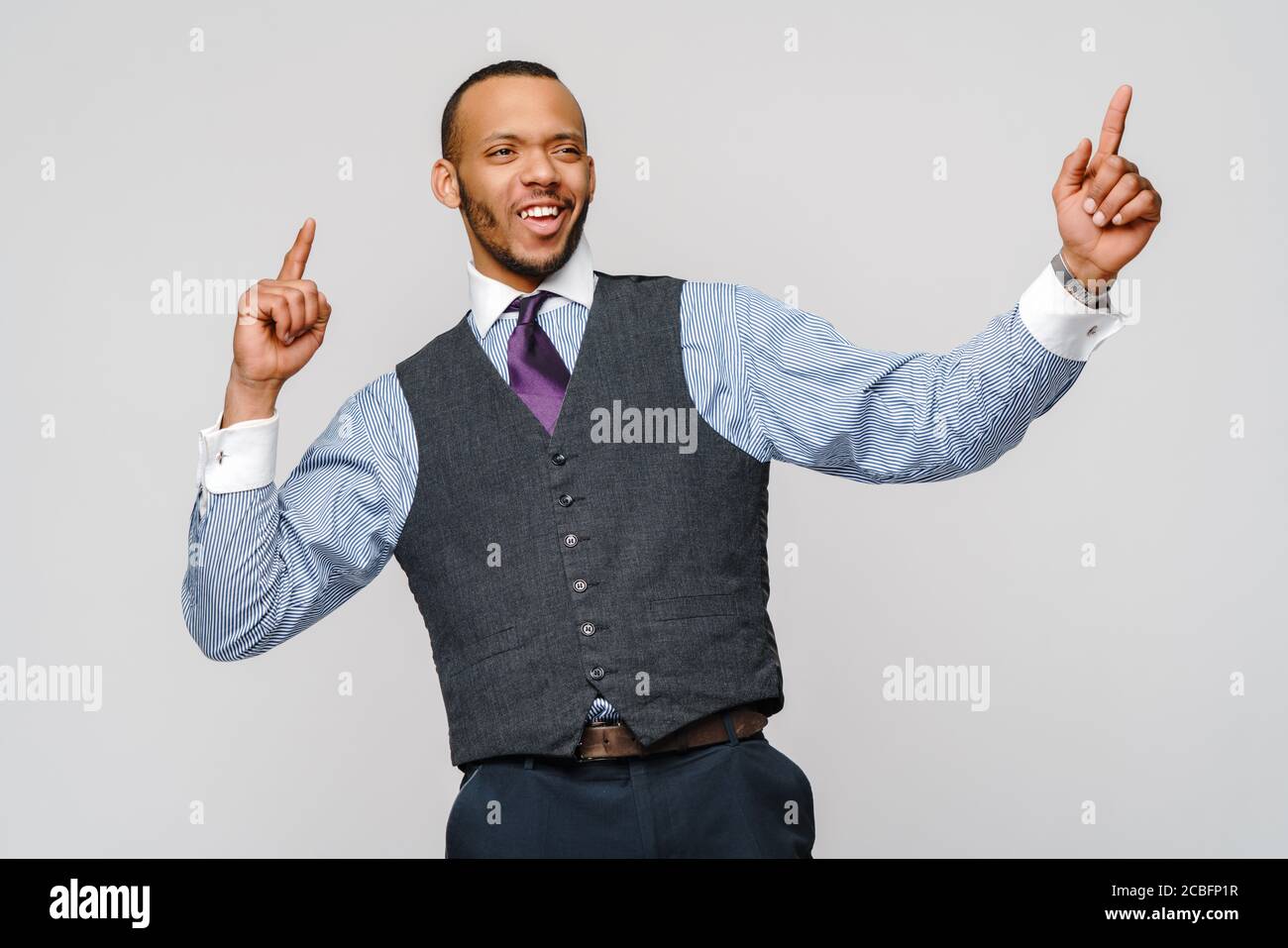 Young smart shouting african-american businessman doing success win ...