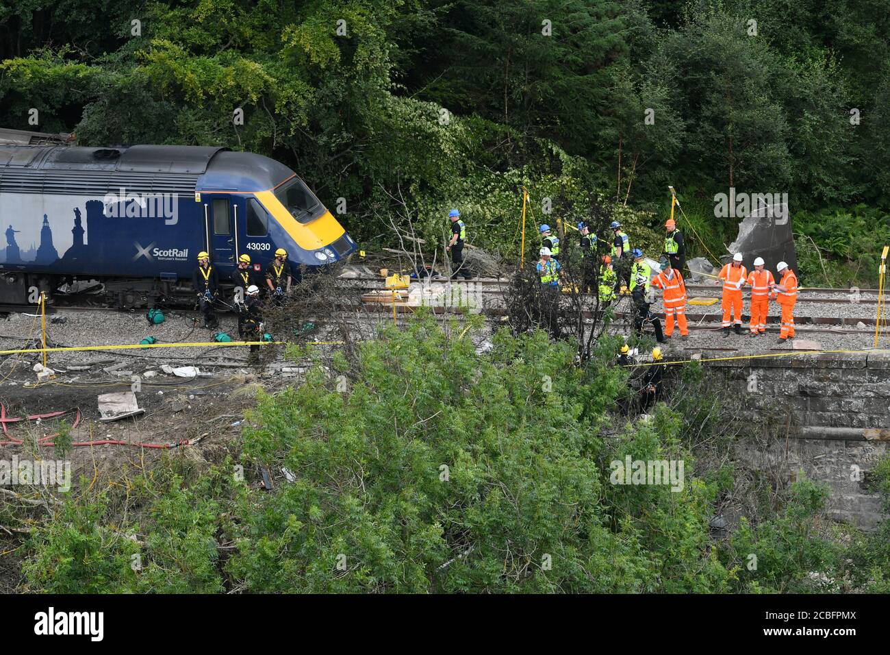 Emergency services inspect the scene near Stonehaven, Aberdeenshire ...