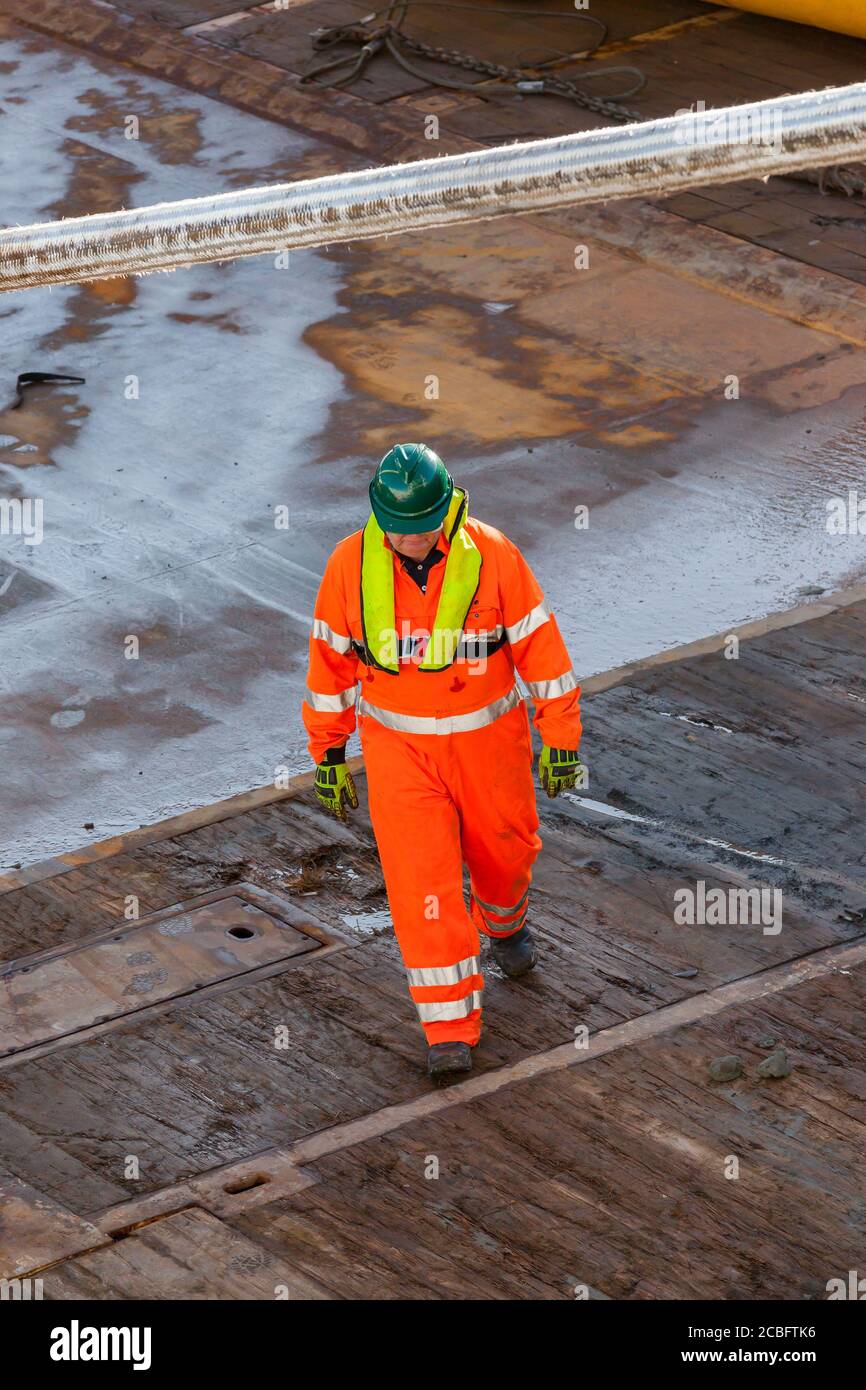 NORTH SEA, NORWAY - 2015 MAY 15. Offshore seaman wearing full safety ...