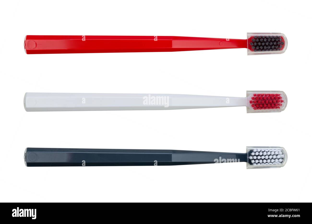 New toothbrushes with transparent plastic lids - black, red and white ...