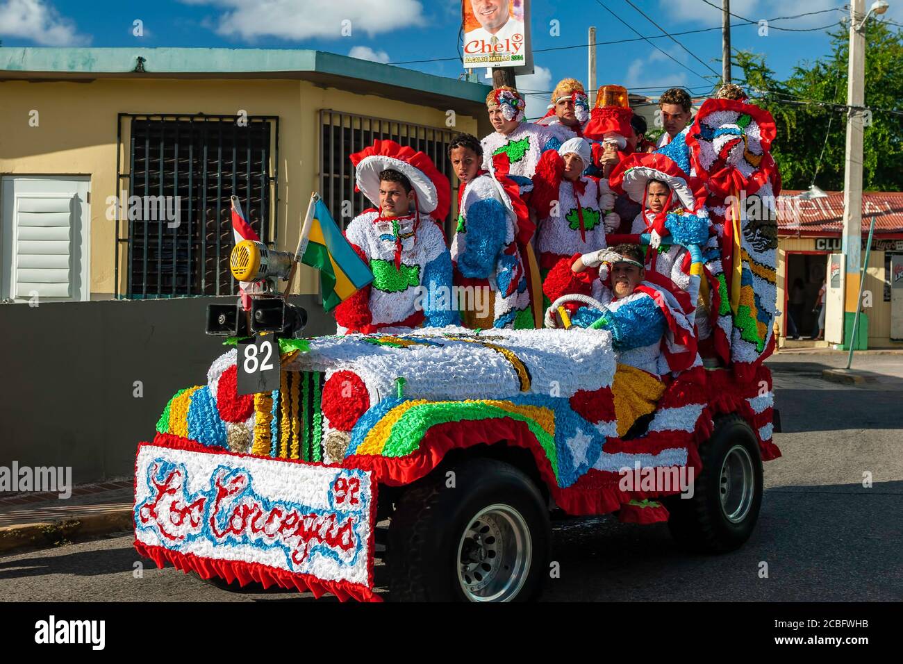 Men in costume on colorful float, Hatillo Mask Festival, Puerto Rico ...