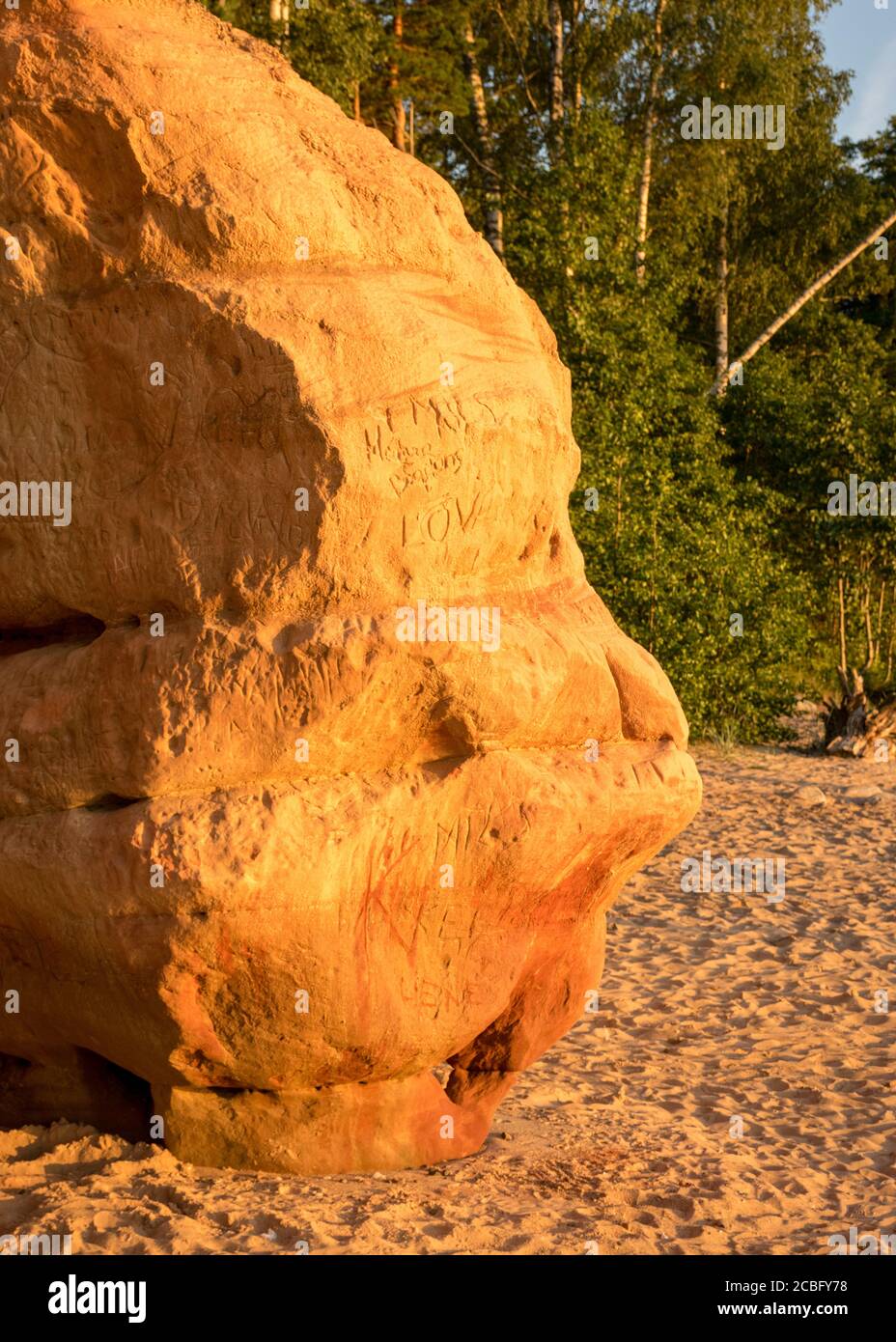 Sandstone cliffs in sunset light, golden hour before sunset, summer ...