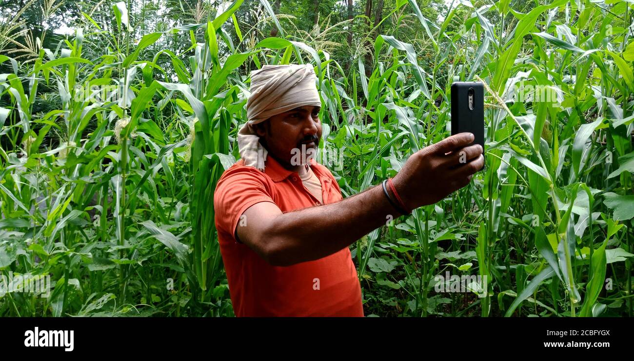 DISTRICT KATNI, INDIA - AUGUST 14, 2019: An indian village farmer doing ...