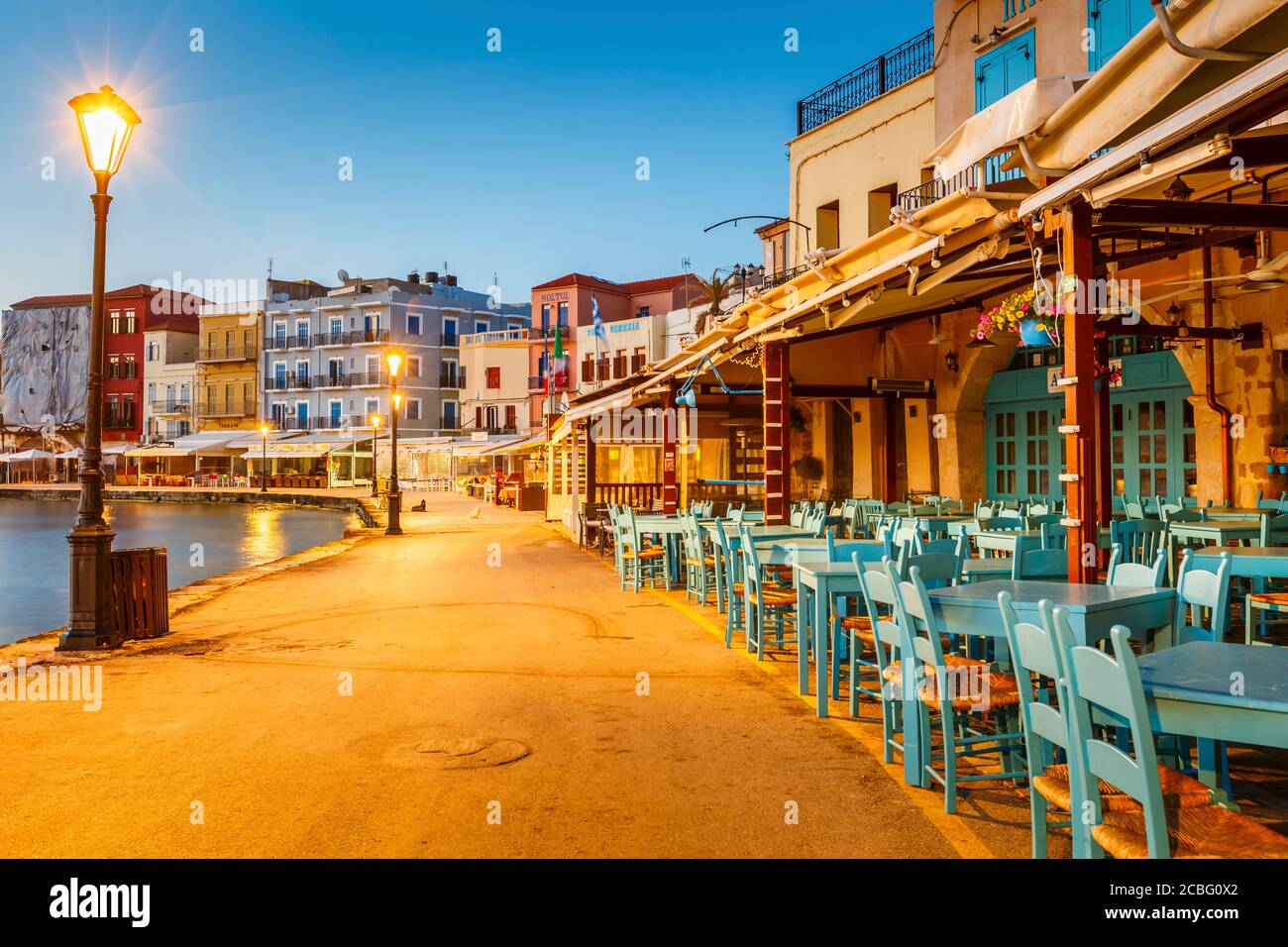 Old Venetian harbor of Chania town on Crete island, Greece Stock Photo ...