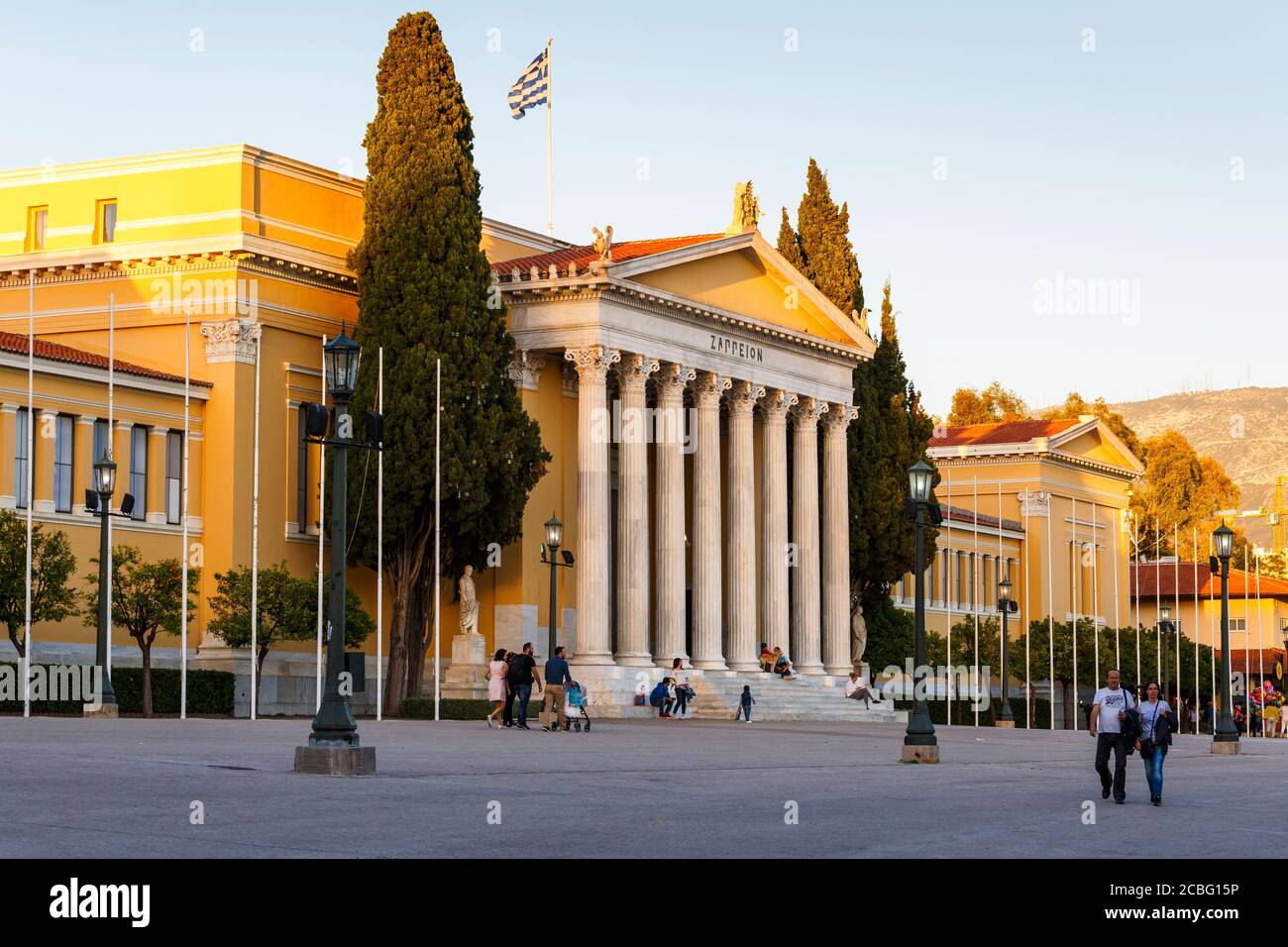 People in front of Zappeion building in the National Gardens of Athens ...