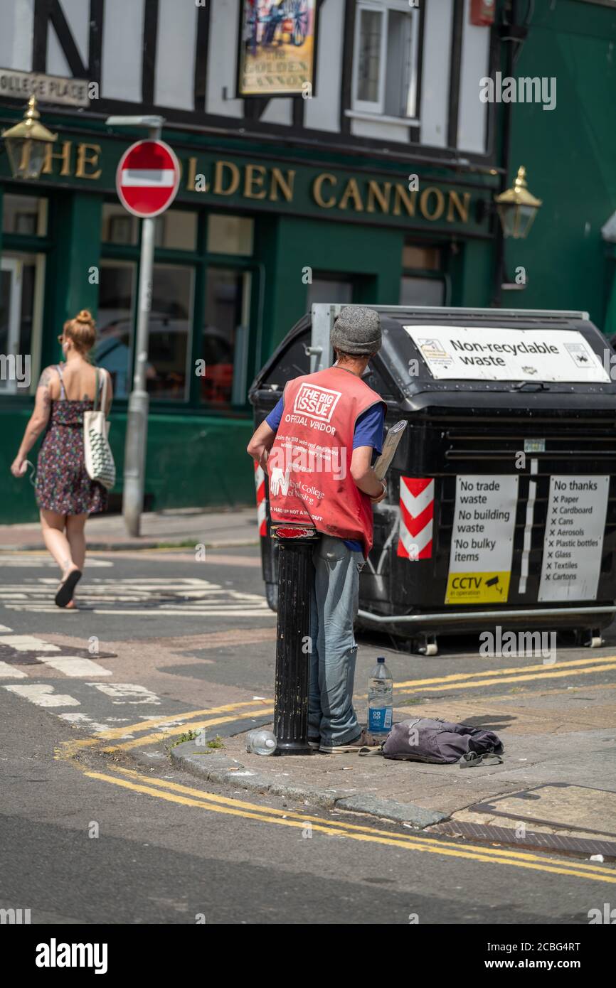 Homeless man selling Big Issue on street corner Kemptown, Brighton ...
