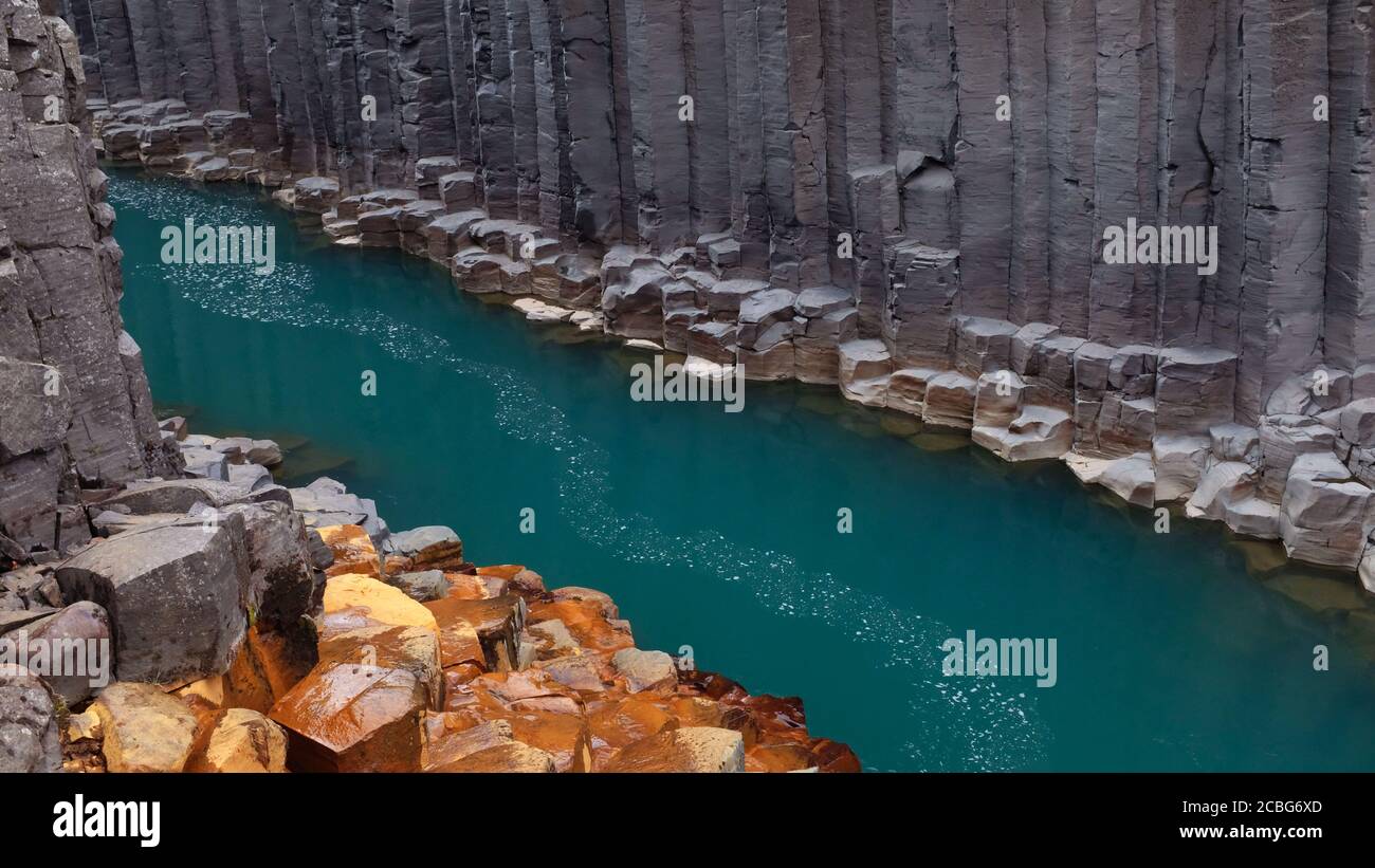 Turquoise Blue Waters and Basalt Columns at Studlagil Basalt Canyon in ...