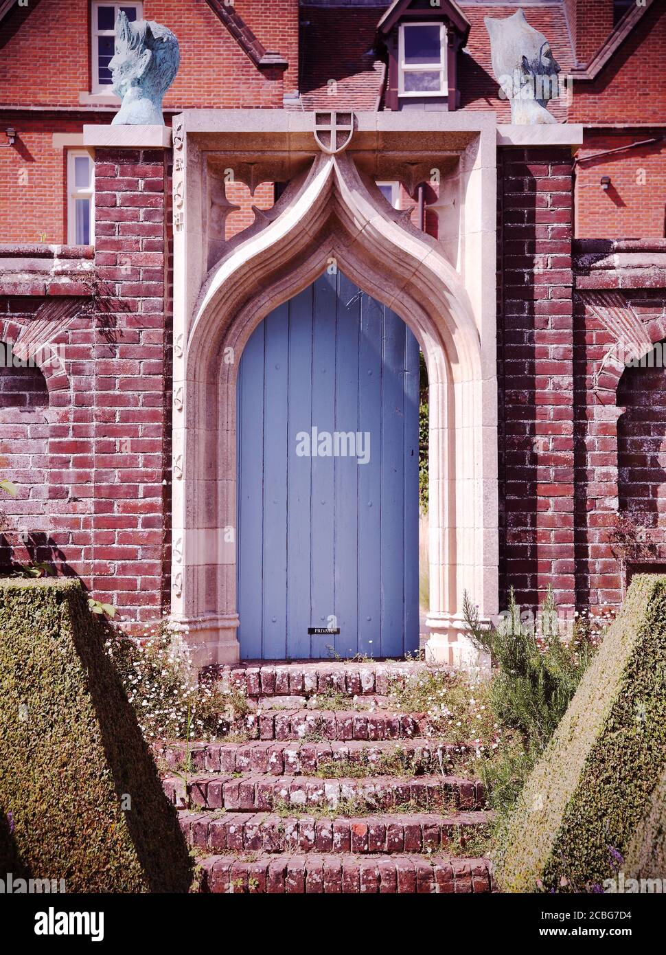 Blue ornate garden gate or door ajar Stock Photo - Alamy