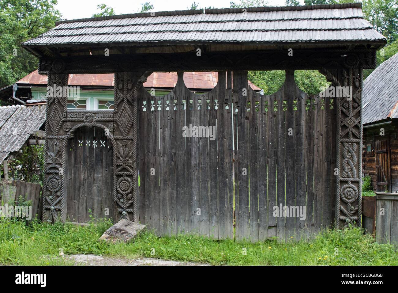Maramures wooden gate to church hi-res stock photography and images - Alamy