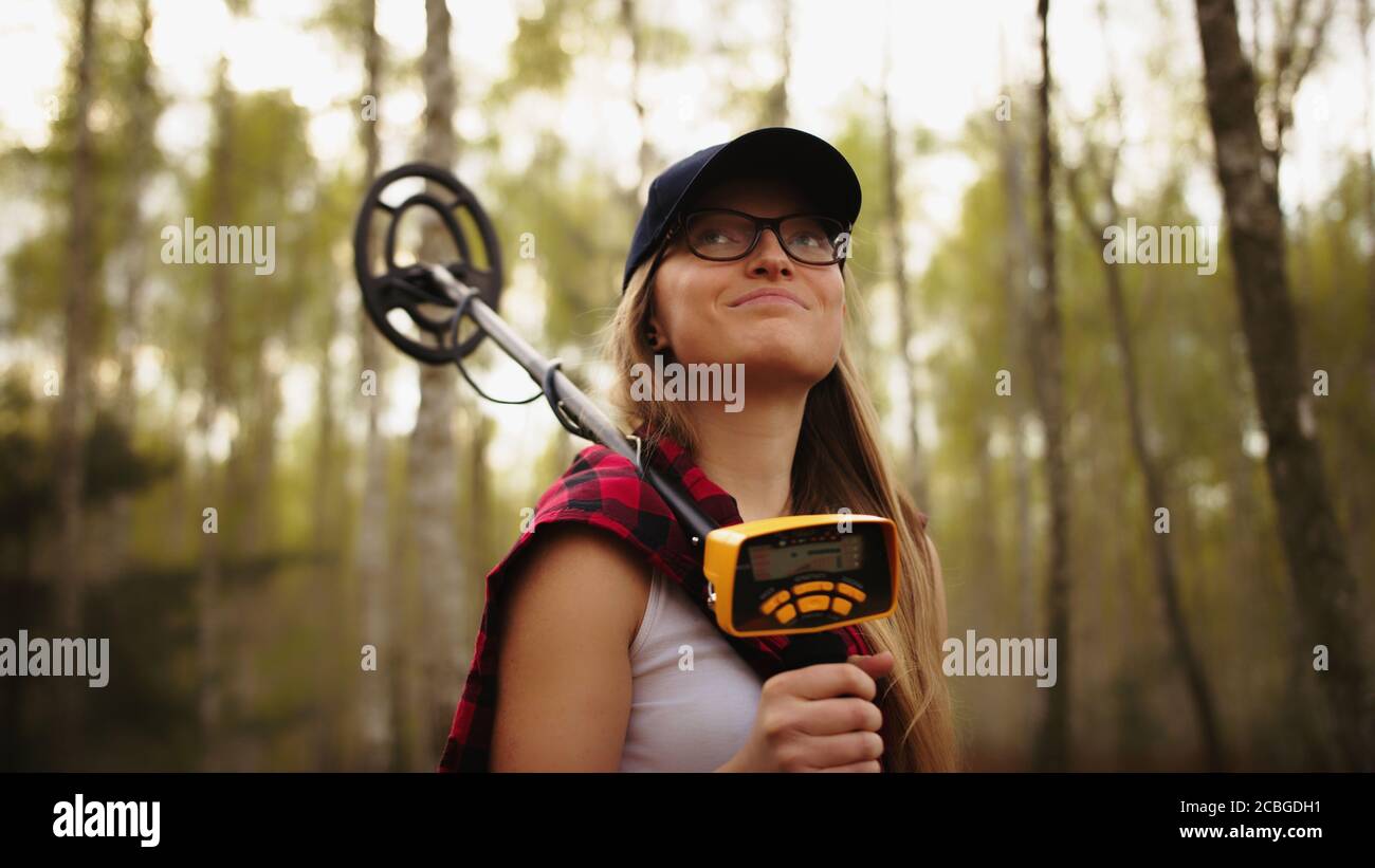 Holding metal detector hi-res stock photography and images - Alamy