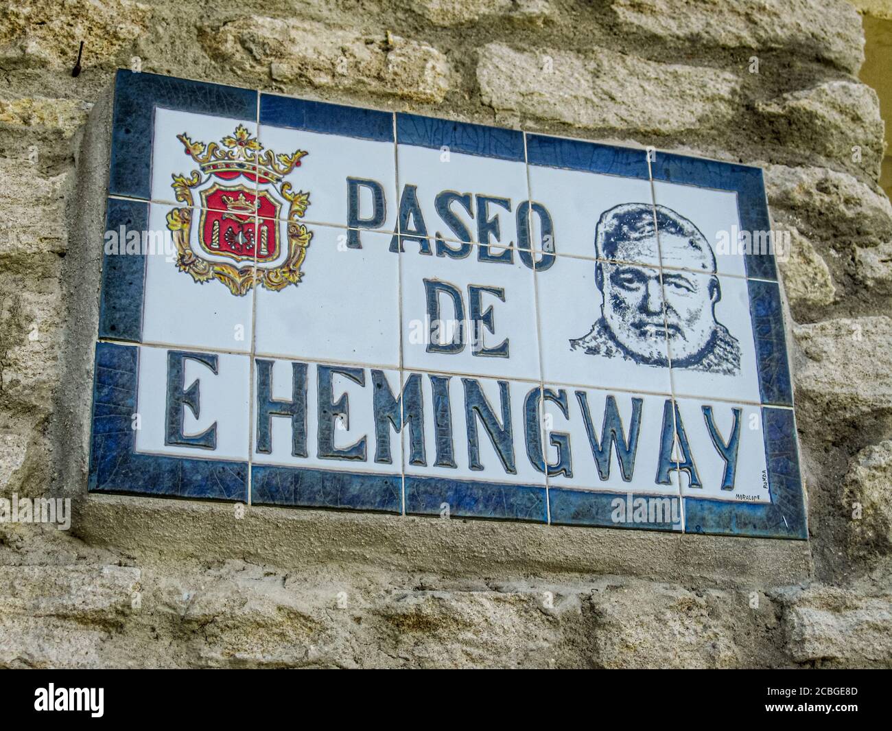 Ronda, Spain - May 2014: Ernest Hemingway Road sign in the historic ...