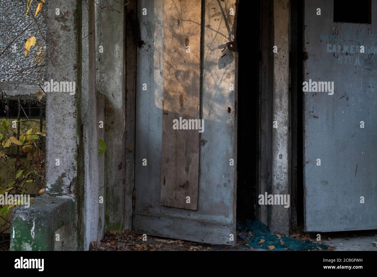 Old wooden door in the entrance of the house Forbidden Chernobyl Zone ...