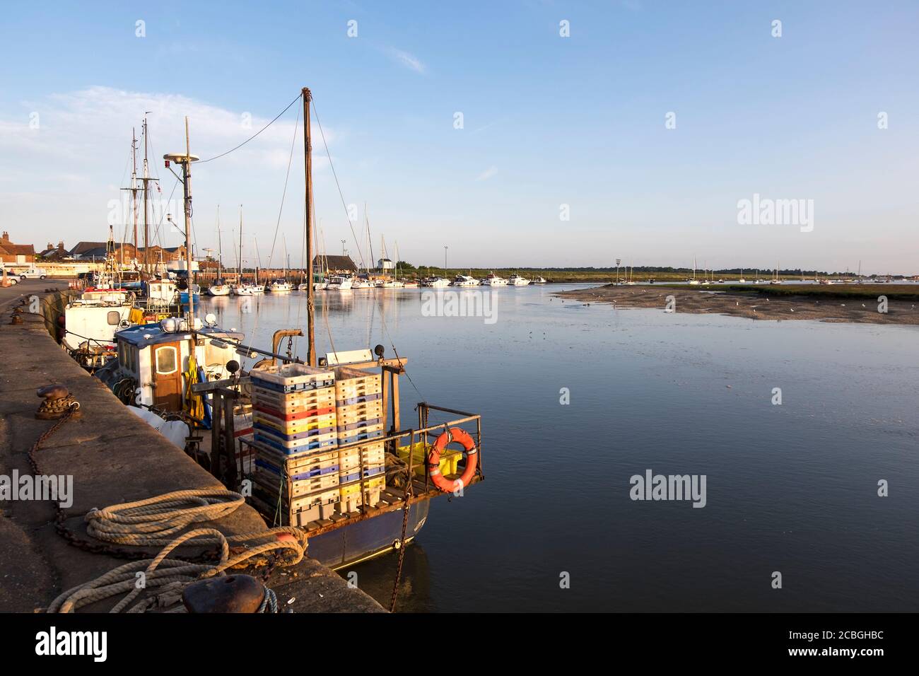 Harbour sunrise scene Stock Photo - Alamy