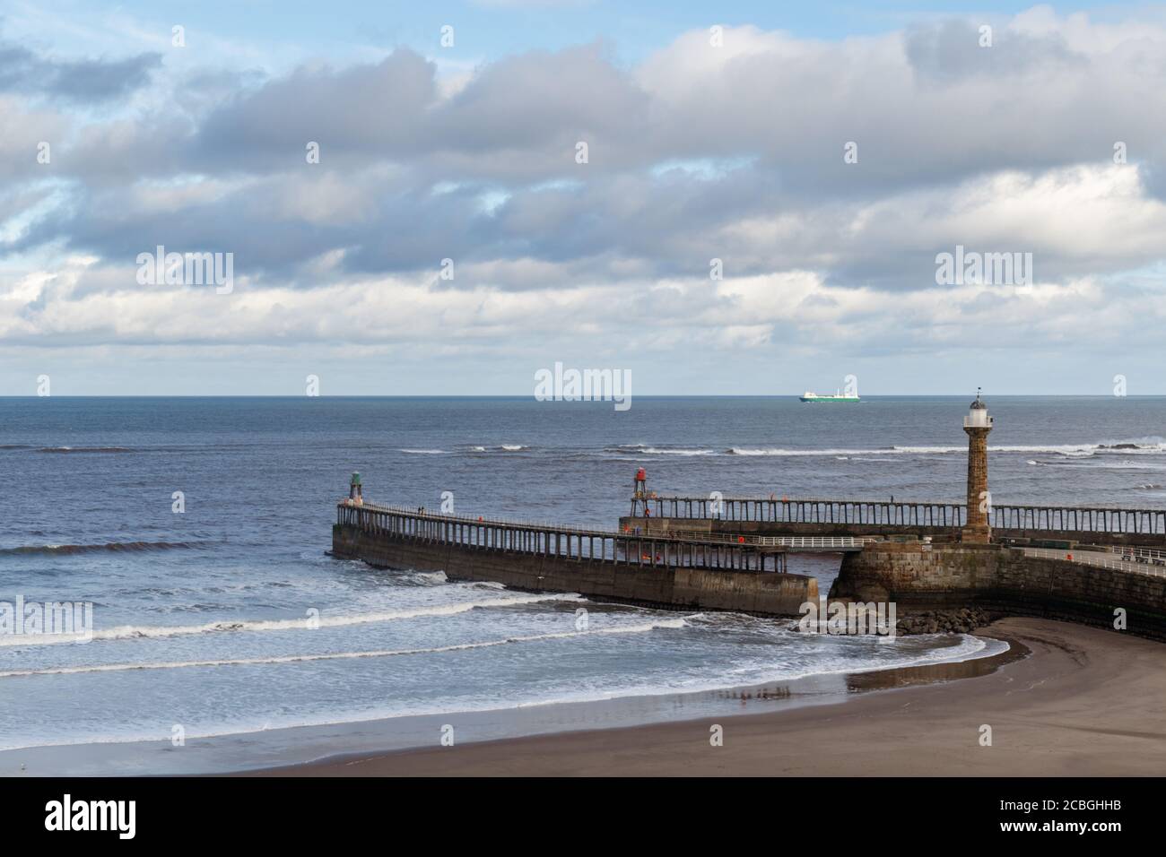 View from west cliff, looking out to sea above Whitby harbour arm ...