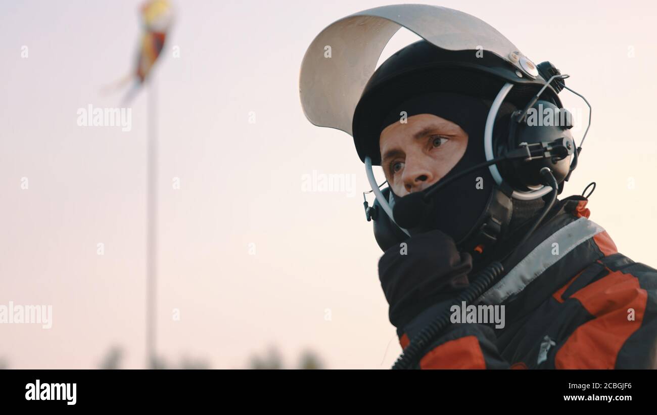 Man removing helmet hi-res stock photography and images - Alamy