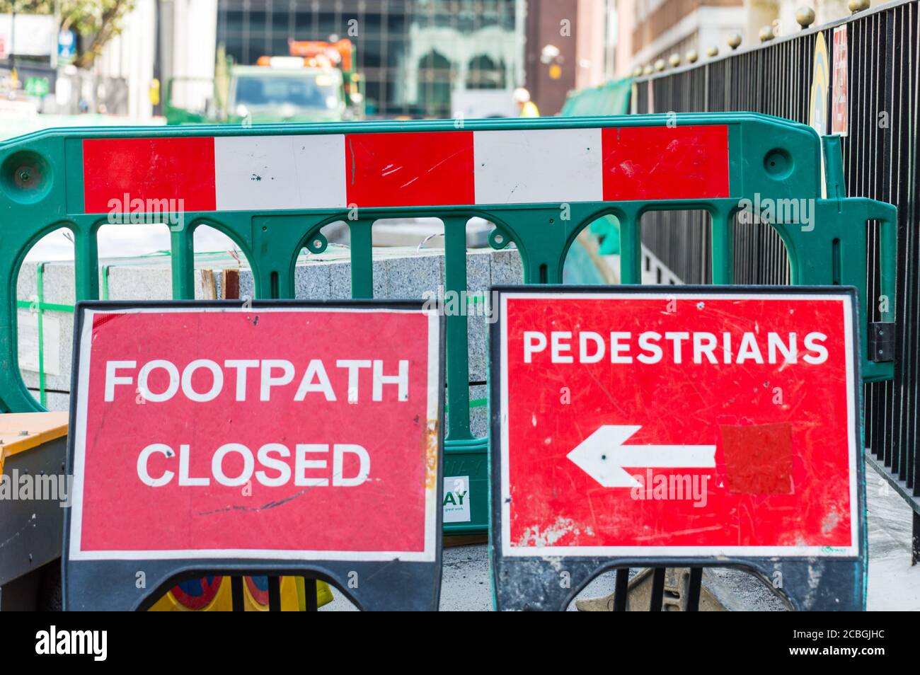 Footpath Closed Pedestrians use opposite side Stock Photo - Alamy