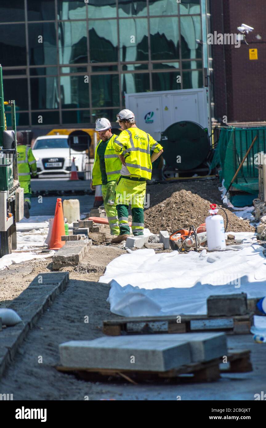 Road works Conway staff working on pavement work in South London Stock ...