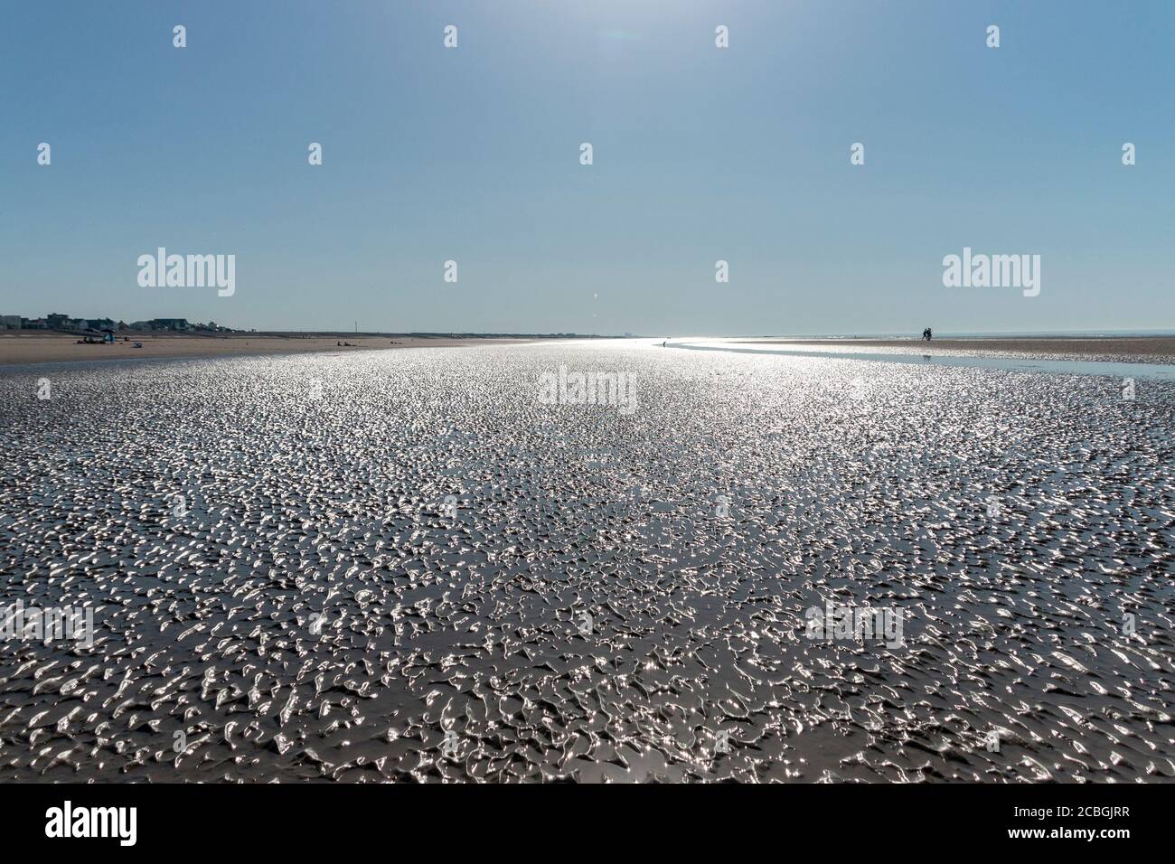 a view of the ripples on the sand left after the low tide has gone out ...