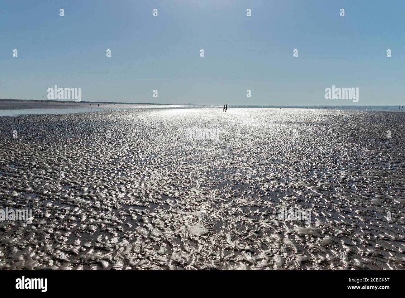 a view of the ripples on the sand left after the low tide has gone out ...