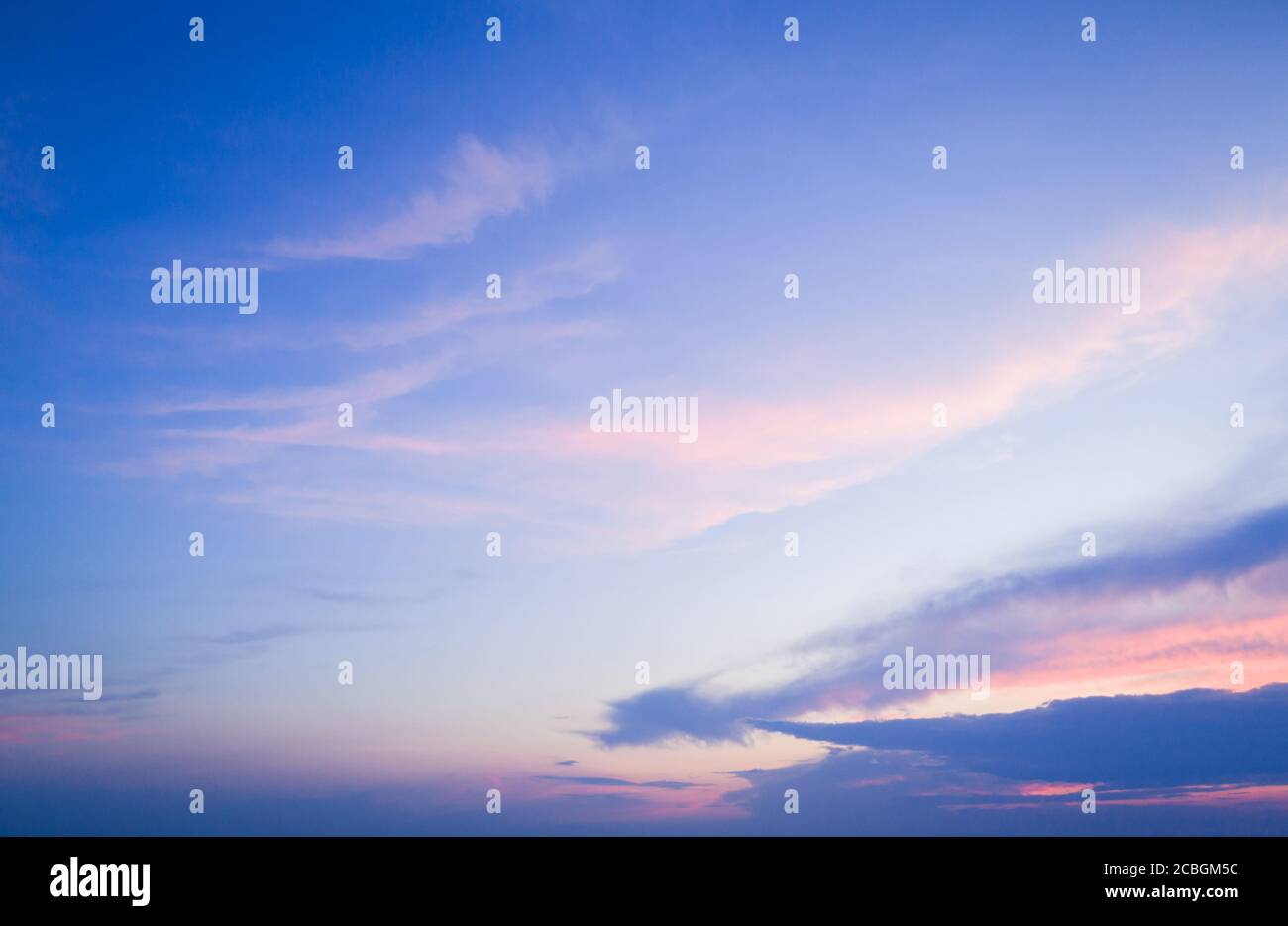 Sunset sky with multicolor clouds Stock Photo - Alamy