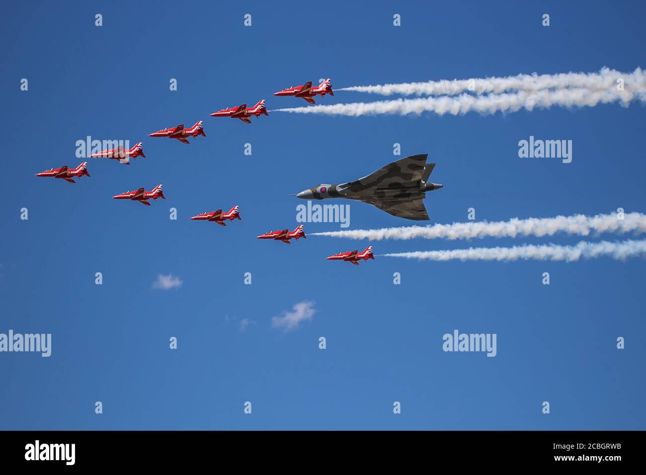 Avro vulcan with the red arrows hi-res stock photography and images - Alamy