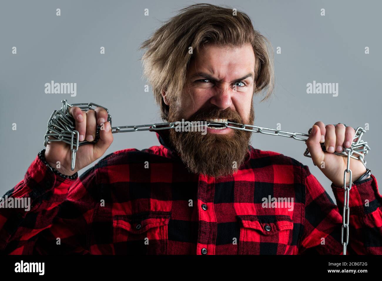 Chained bearded man hi-res stock photography and images - Alamy