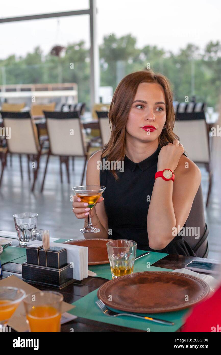 Girl in cocktail dress hi-res stock photography and images - Alamy