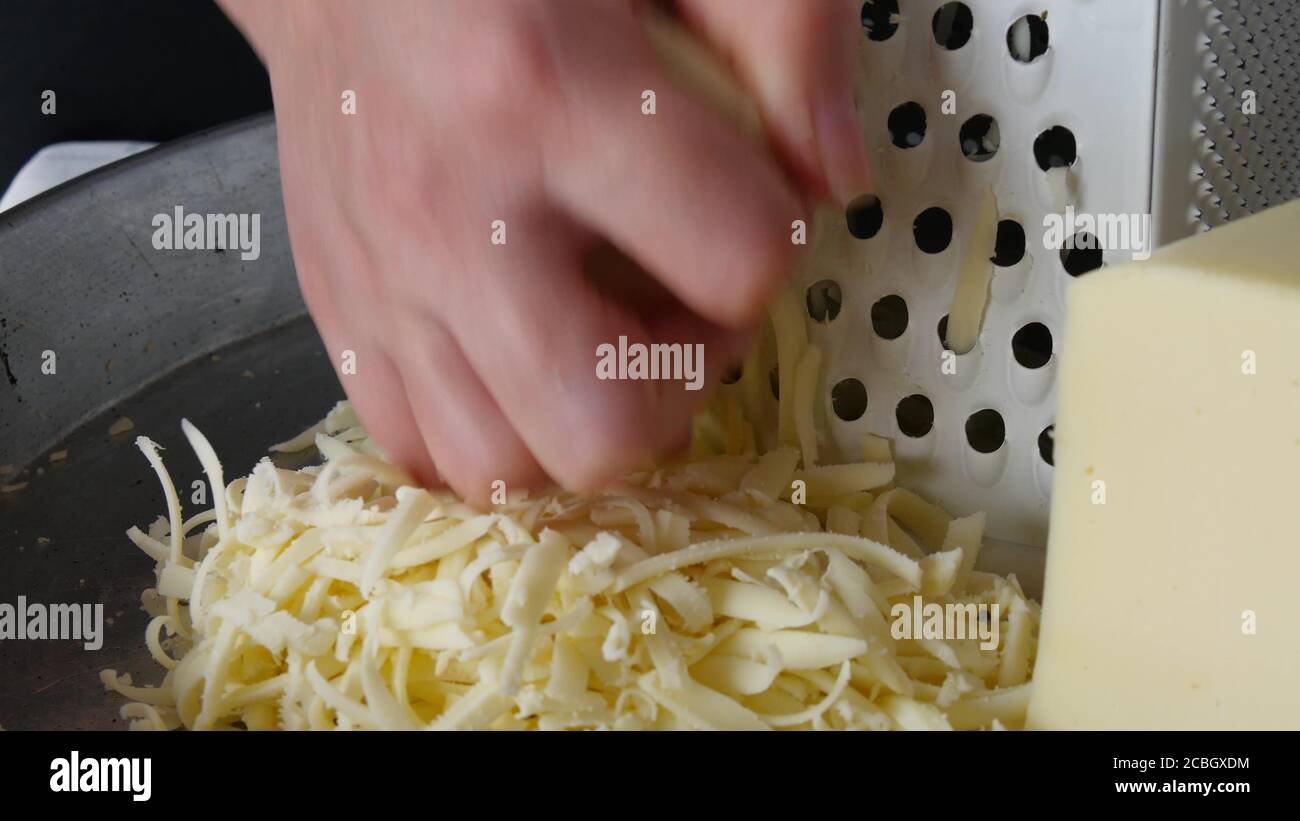 Grating cheese pizza hi-res stock photography and images - Alamy