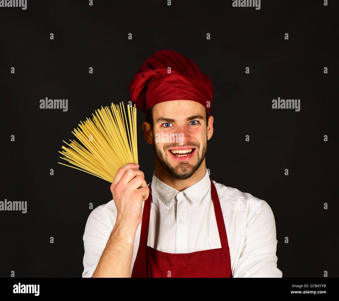 Italian food and traditional meal concept. Chef with happy face holds ...