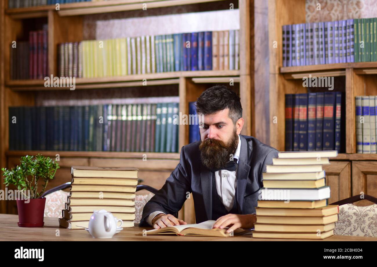 Science and studying concept. Man in classic suit or professor with ...