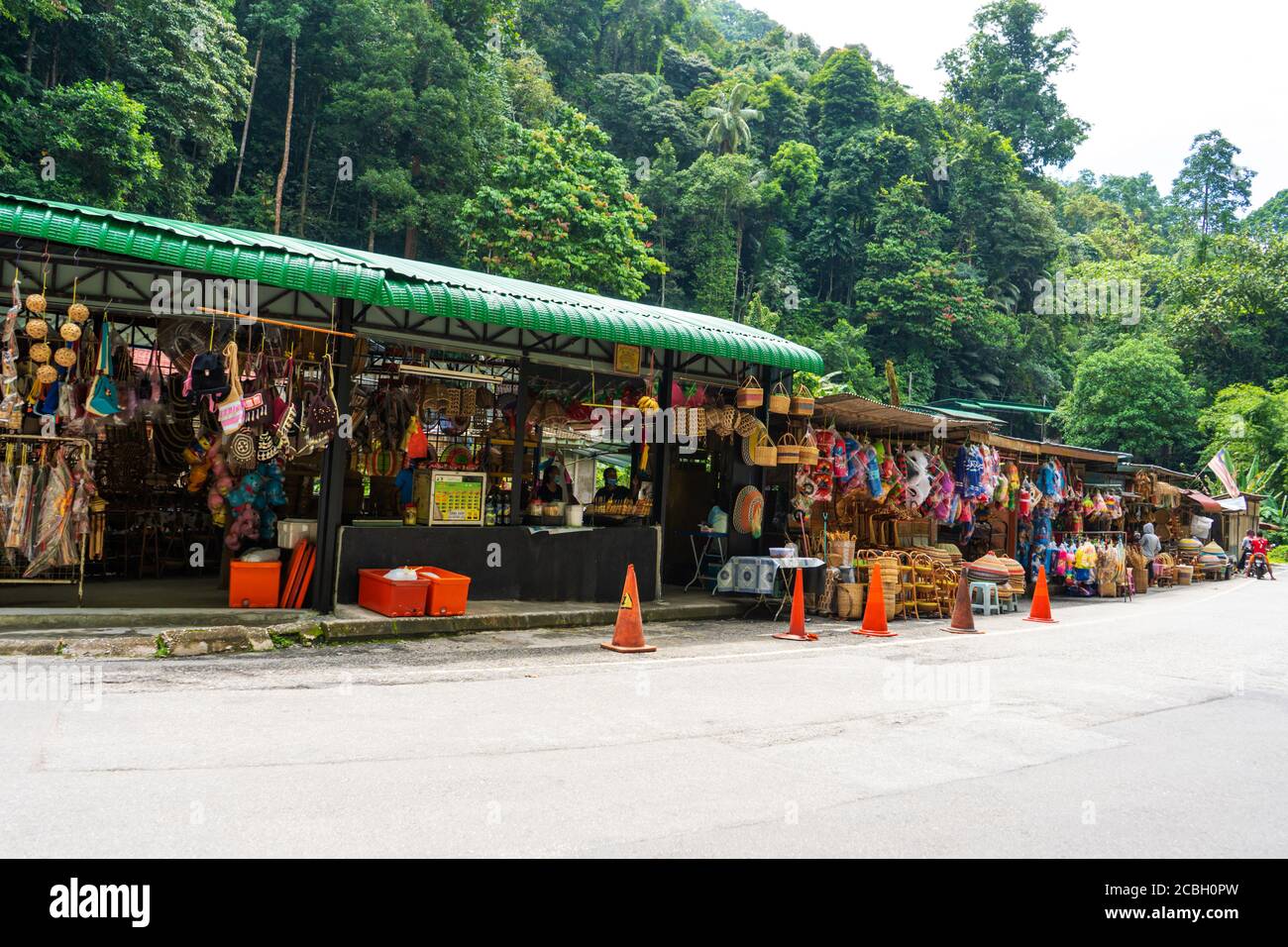 Asian street shops selling souvenirs and trinkets along the road Stock ...