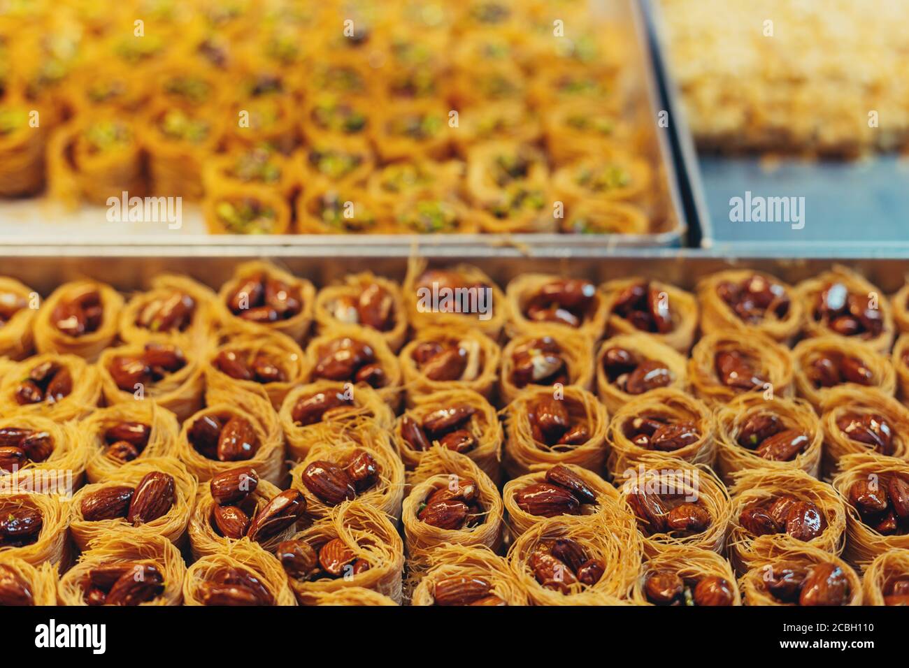 Traditional arabic sweets (dessert kadaif, kunafa, baklava) in the ...