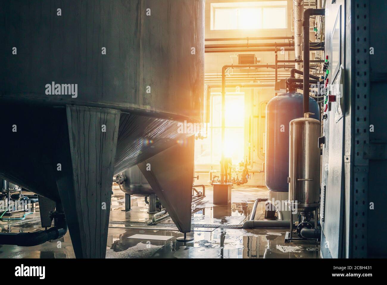 Reservoirs, tanks and pipes in modern beverage production plant or ...