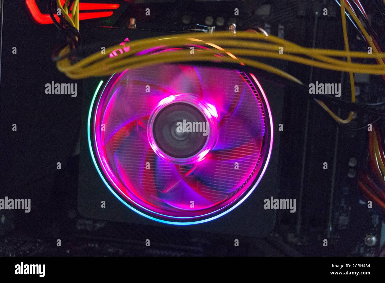 Close up view of neon light processor cooler Stock Photo - Alamy