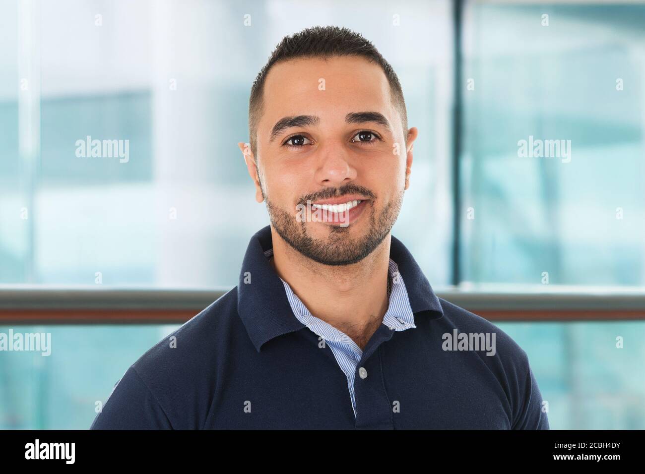 Smiling in the workplace hi-res stock photography and images - Alamy