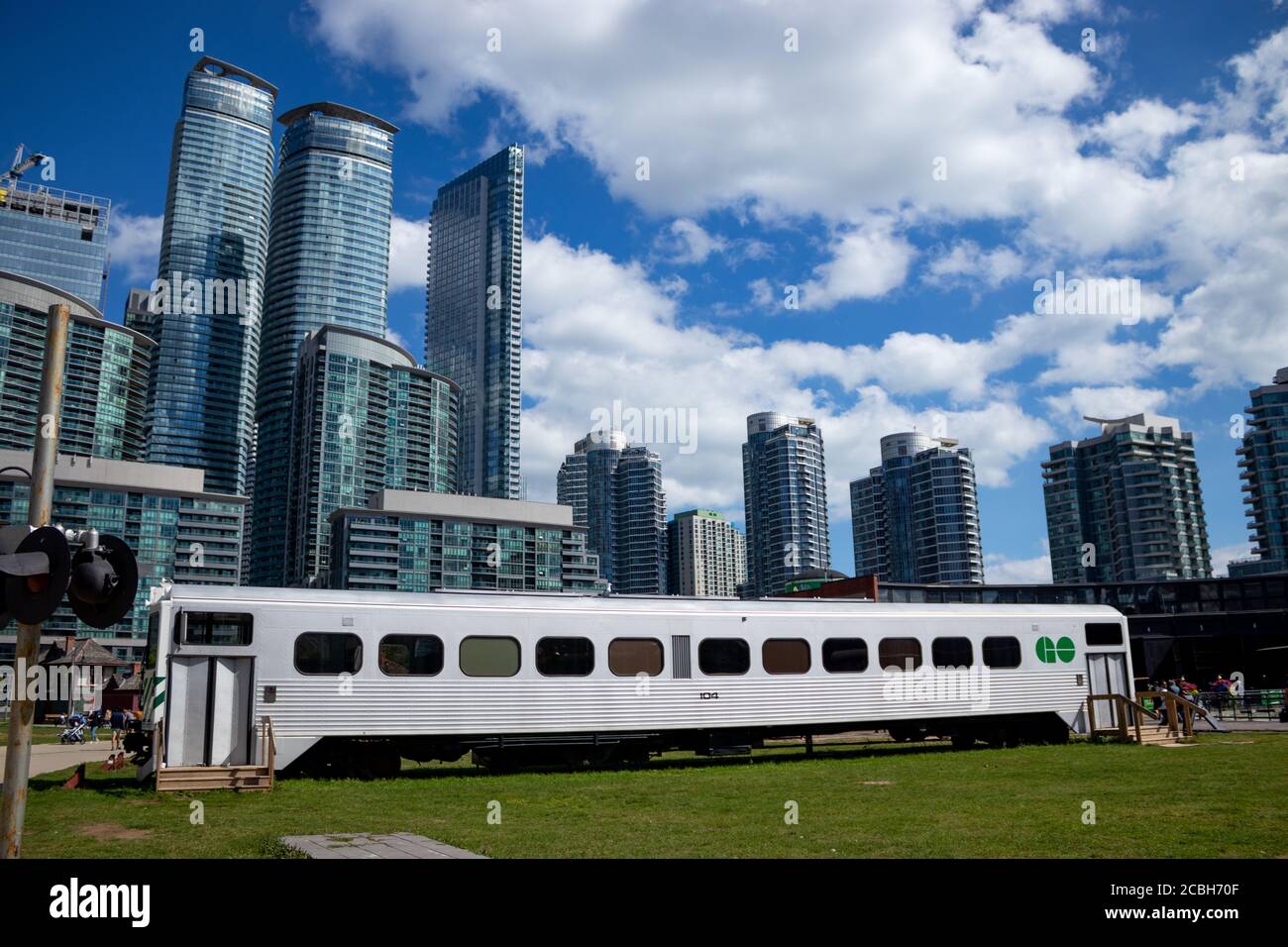 Downtown Toronto cityscape view with disused railcar in the foreground ...