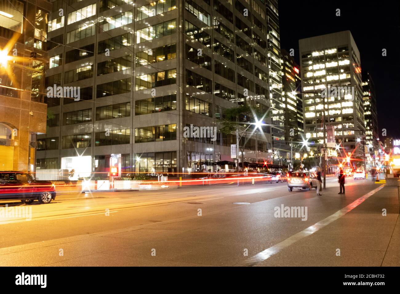 Streamed lights in downtown Toronto during evening Stock Photo - Alamy