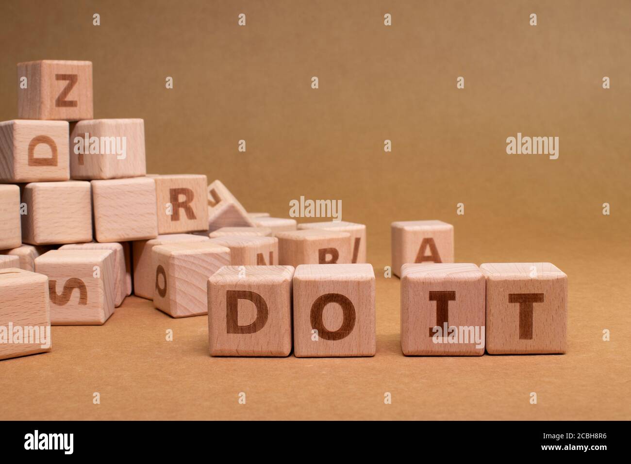 DO IT text made with wooden blocks Stock Photo - Alamy