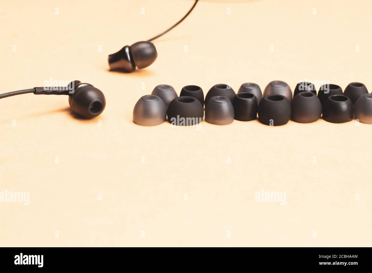 Earphones with row of ear cushions. in-ear headphones with many ...