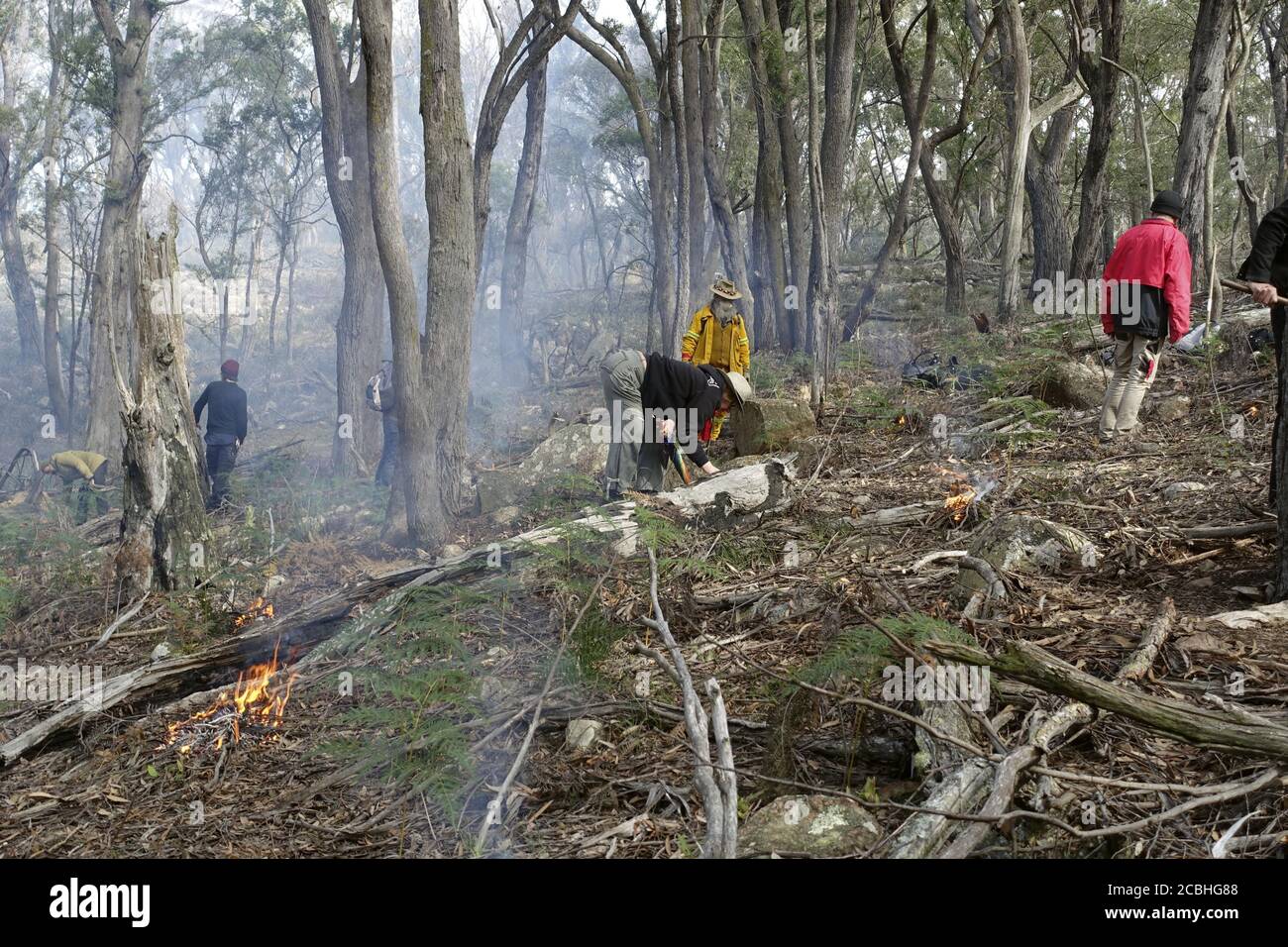 People Participate In A Workshop On Aboriginal Fire Stick Farming In
