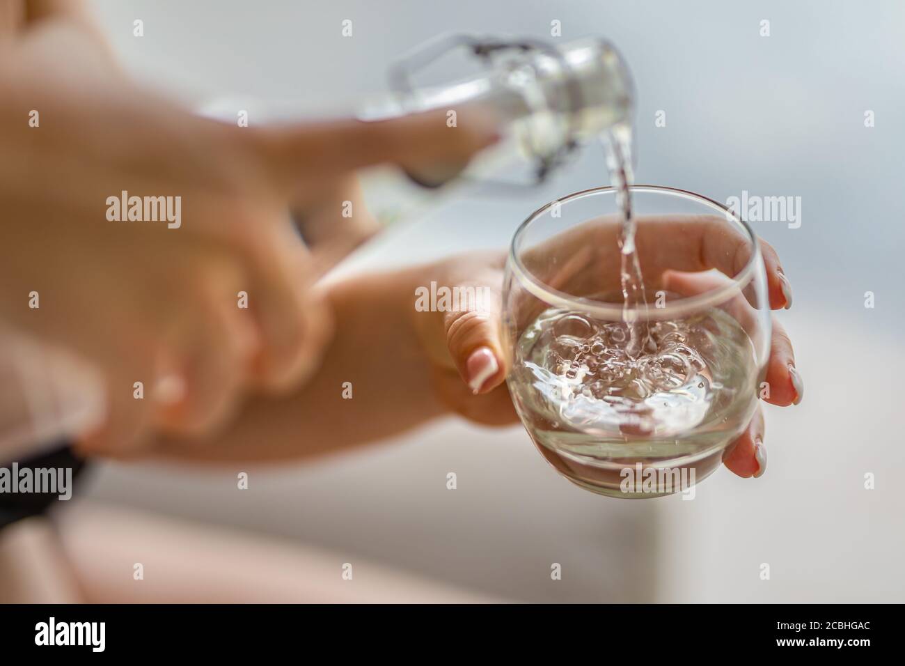 How to pour water from bottle hi-res stock photography and images - Alamy