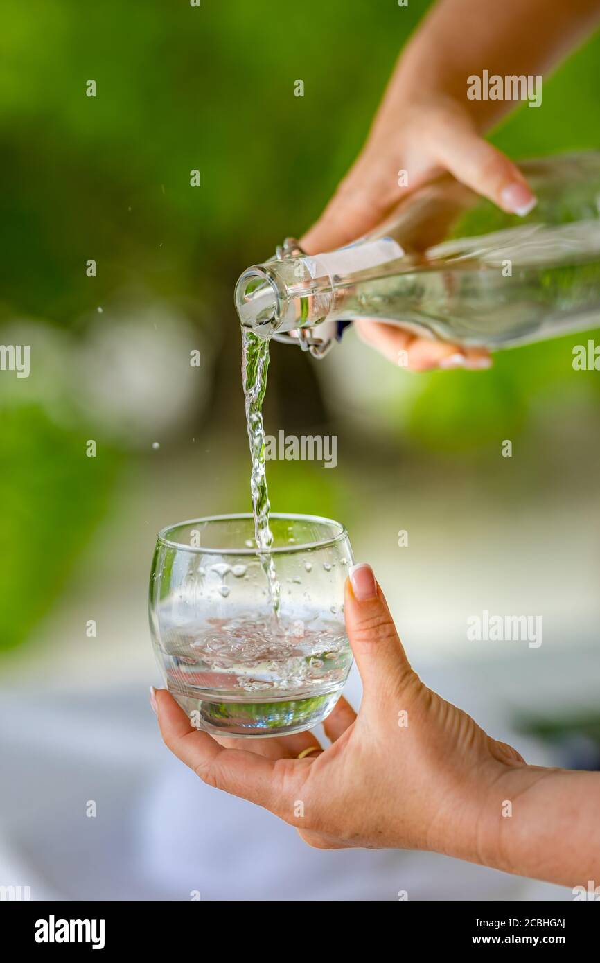 How to pour water from bottle hi-res stock photography and images - Alamy