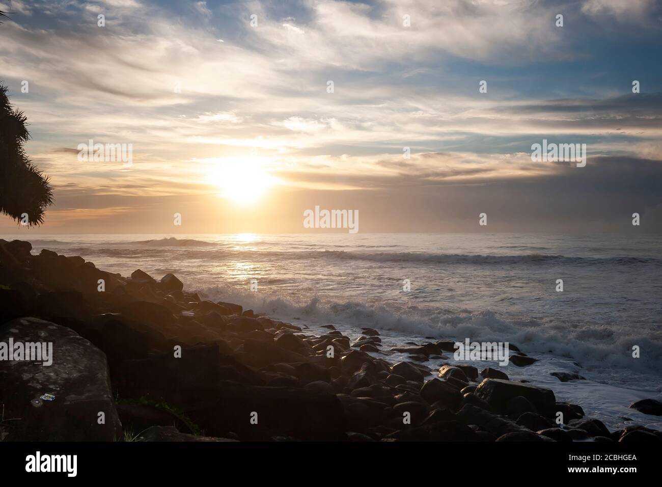Ocean waves breaking on the rocky beach Stock Photo - Alamy
