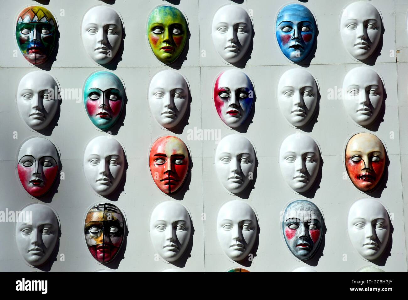 Colorful masks on white background Stock Photo - Alamy