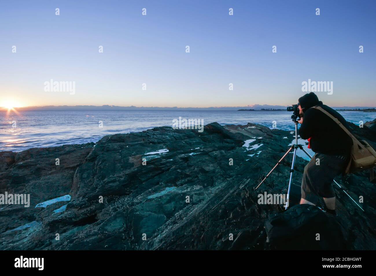 Currumbin, Australia - June 22, 2007: A photographer taking shot of ...