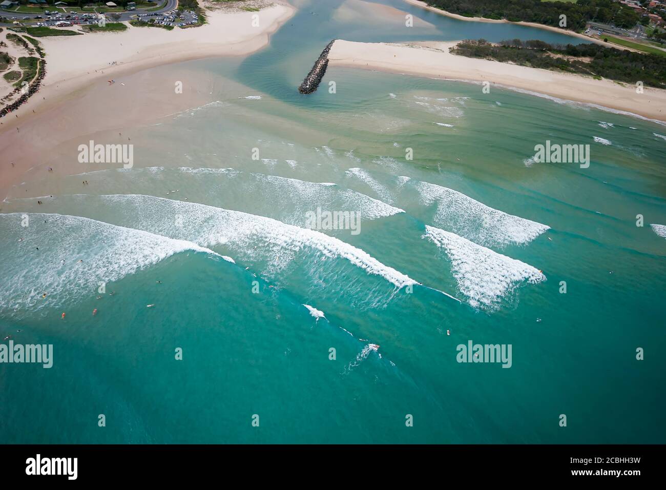 Empty beach in front of a city Stock Photo - Alamy