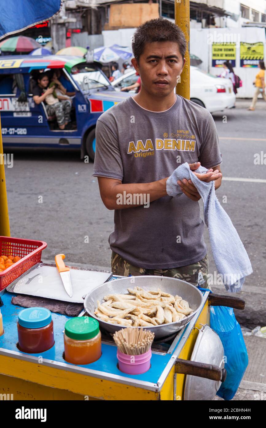 Cebu / Philippines - July 10, 2019: portrait of Filipino man selling ...