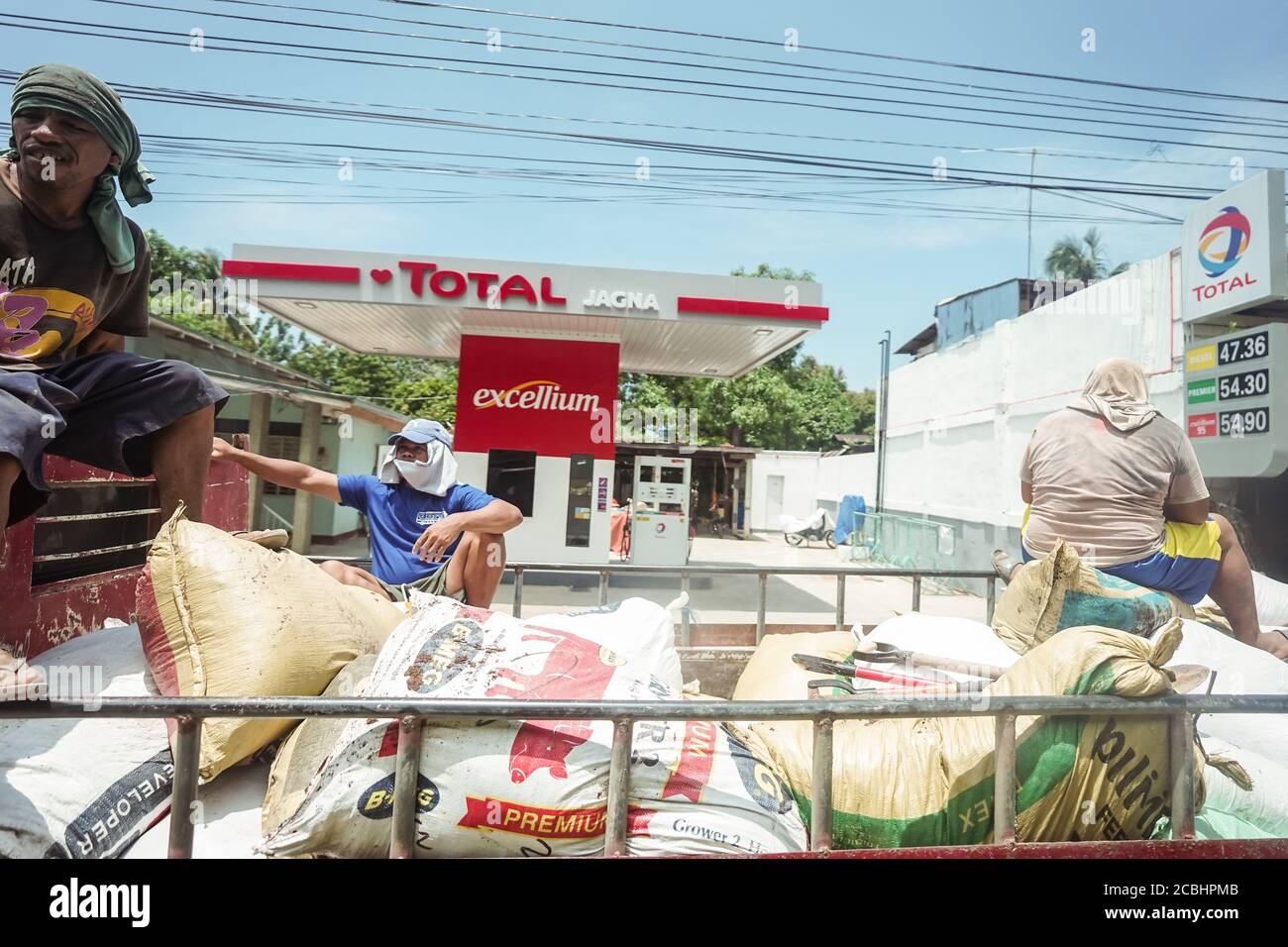Bohol / Philippines - July 18, 2019: Filipino construction workers ...