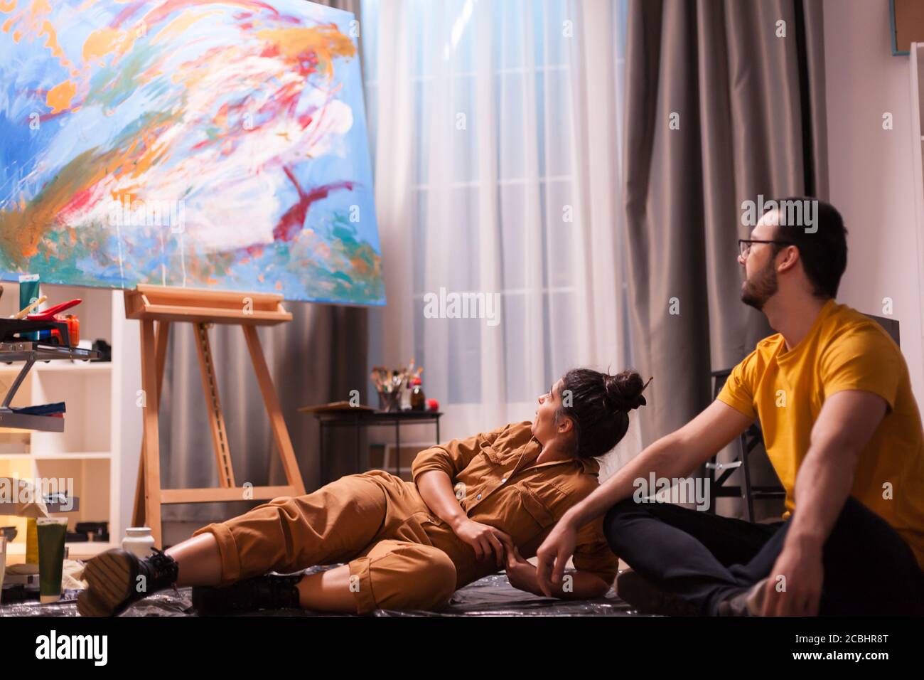 Painter and is partner having a conversation about abstract painting on ...
