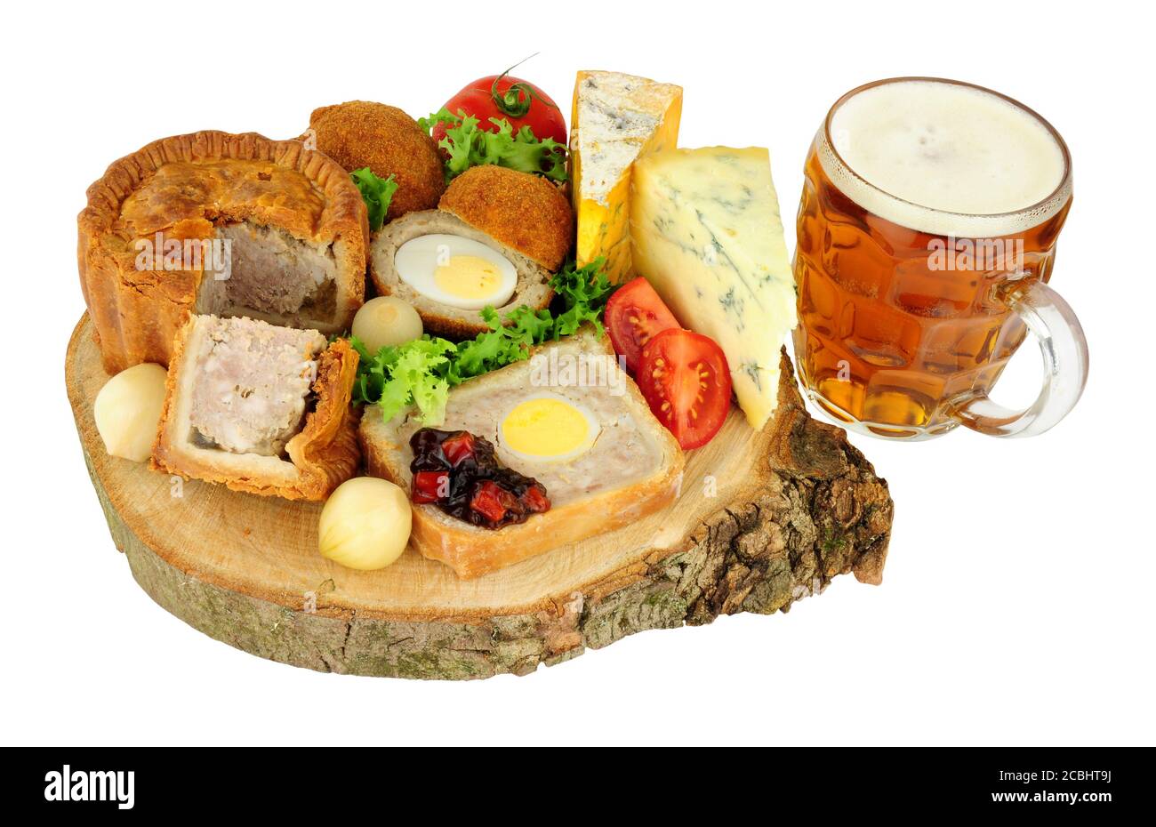 Traditional ploughman's buffet lunch ingredients with a pint of beer ...